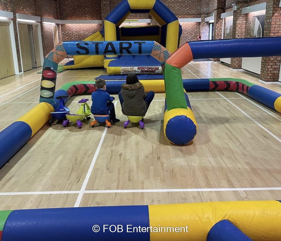 Swing Cars Race Track: The Ultimate Inflatable Fun! Call our team Now!